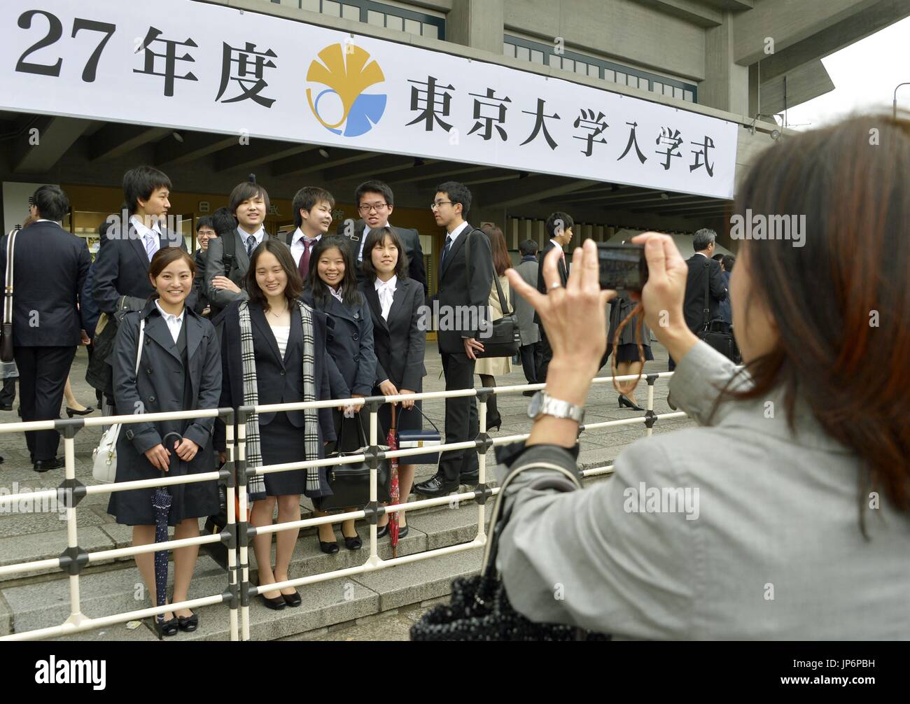 New students of the University of Tokyo pose for a photo ahead of the ...
