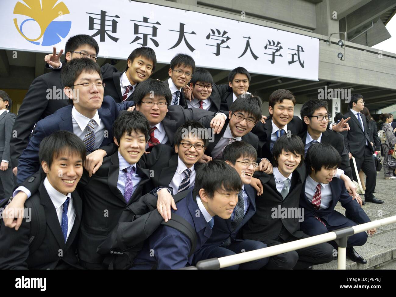 New students of the University of Tokyo pose for a photo ahead of the ...
