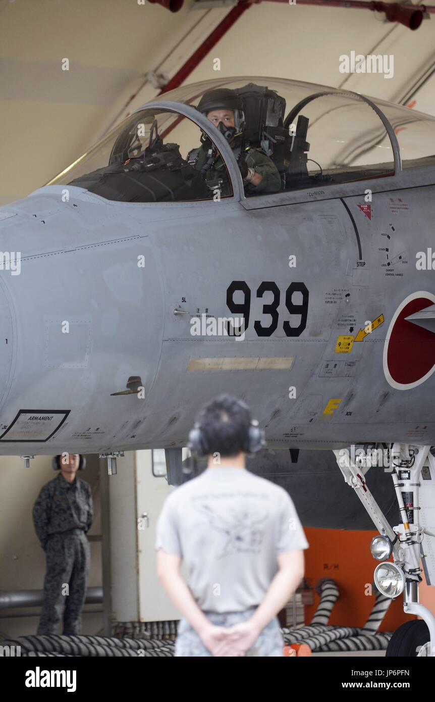 A pilot waits for a takeoff signal in the cockpit of an F-15 fighter ...