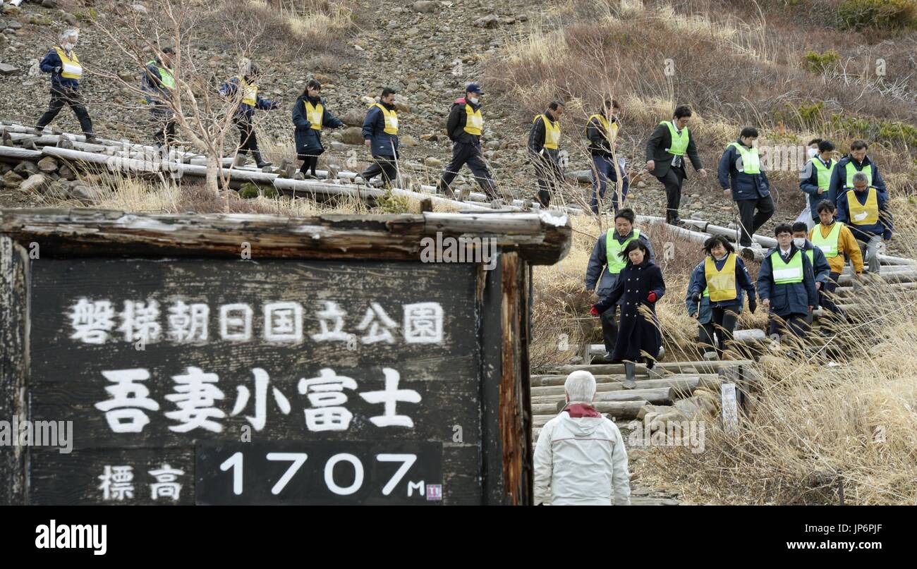 Local officials take part in a drill simulating a volcanic eruption at ...
