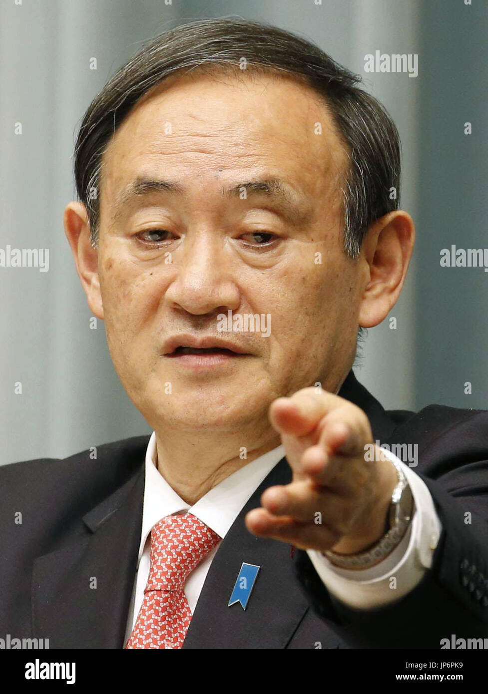 Chief Cabinet Secretary Yoshihide Suga attends a press conference in ...