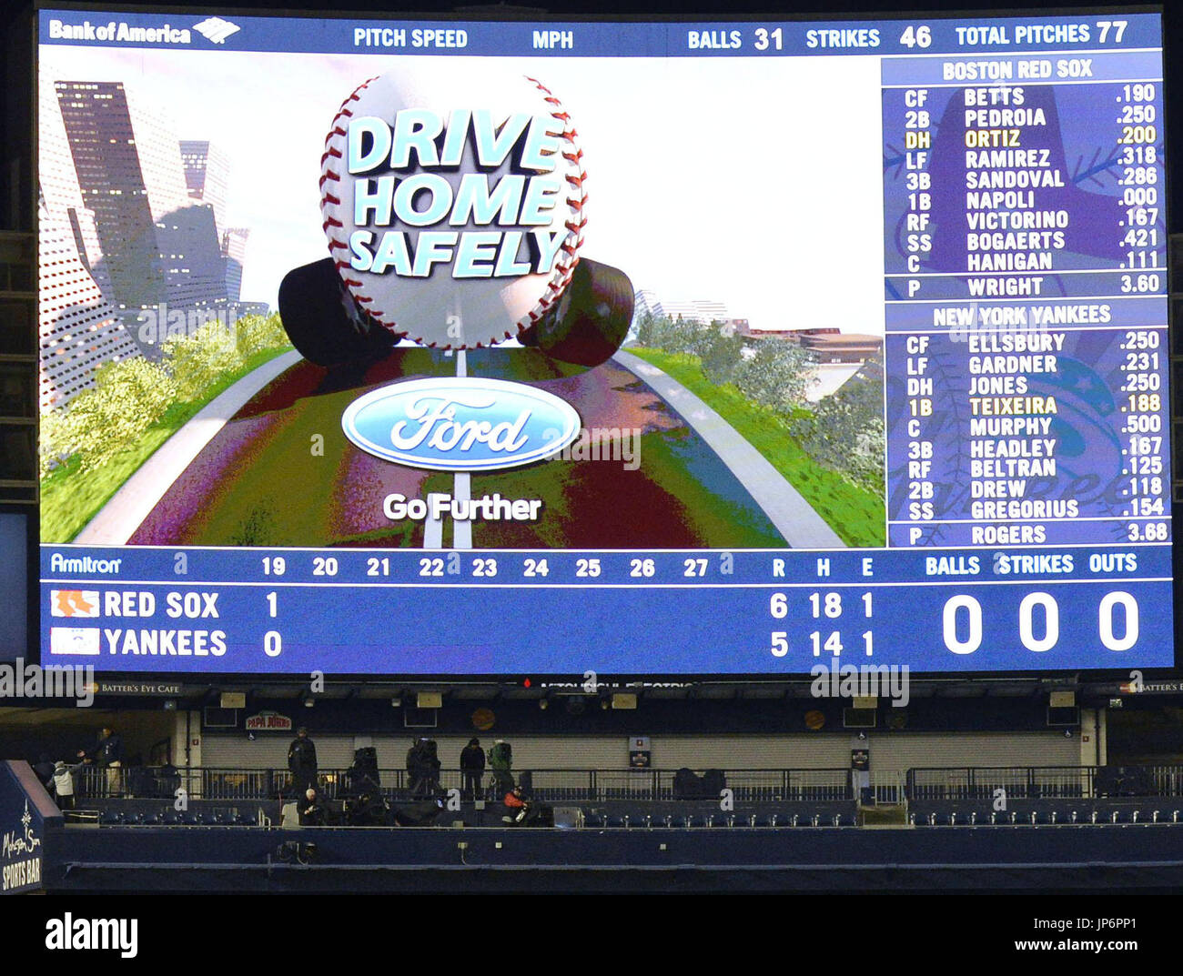 The electronic scoreboard shows the final score of a 19-inning game ...