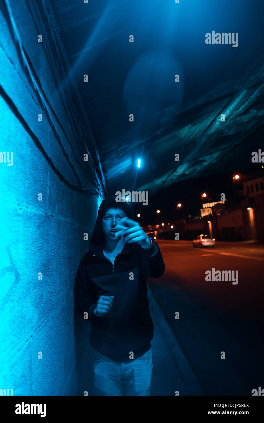 Hooded man night bridge hi-res stock photography and images - Alamy