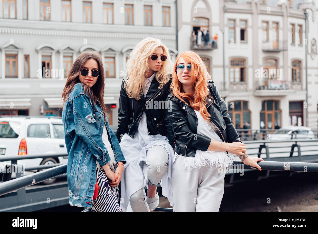 three beautiful girls on the street Stock Photo - Alamy