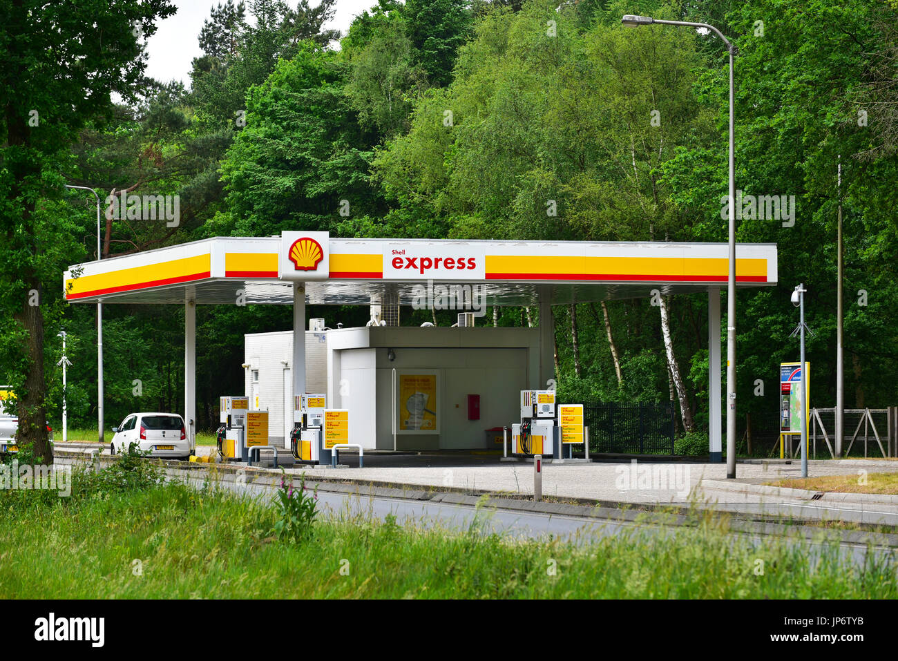 Unmanned self-service Shell express fuel station Stock Photo - Alamy
