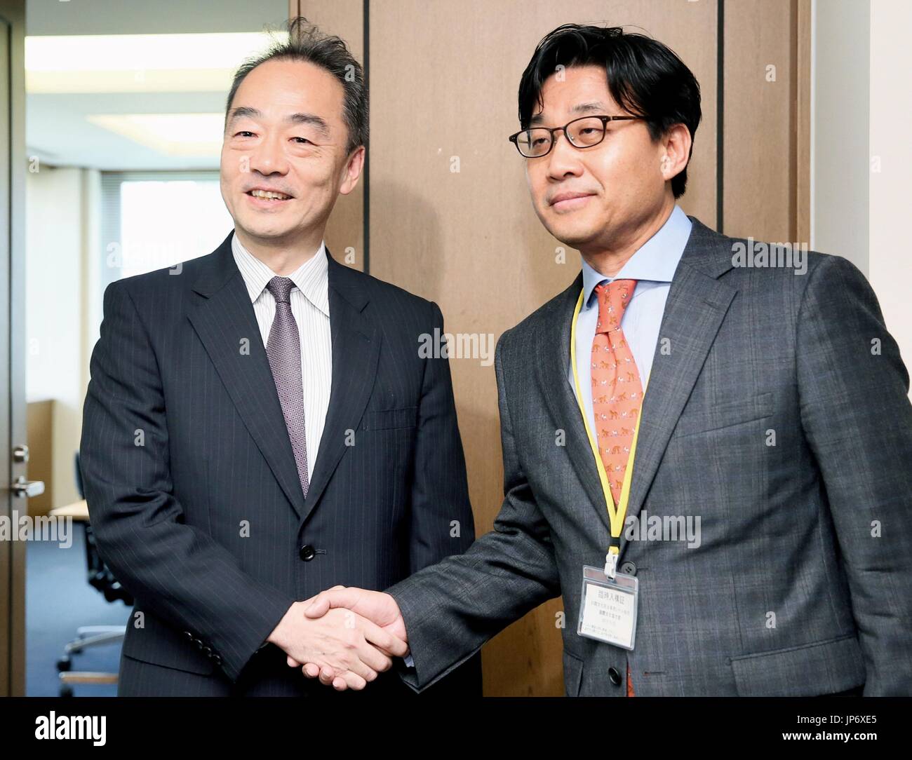 Jun Shimmi (L), director general for cultural affairs at Japan's Foreign Ministry, and Choi Jong ...