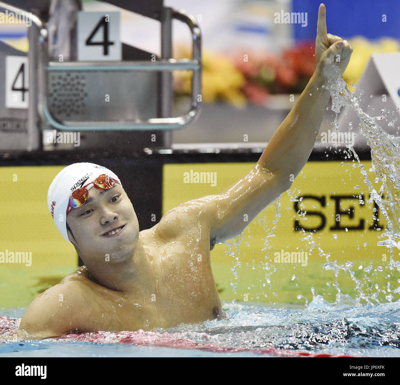 Katsumi Nakamura celebrates after setting a national record in the men ...