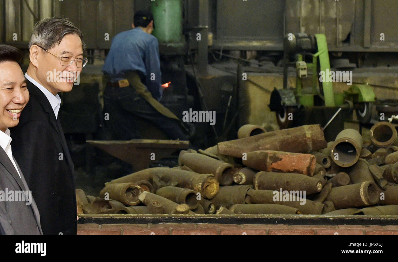Zhang Zhijun (2nd from L), director of China's Taiwan Affairs Office ...