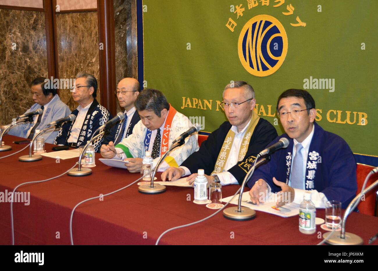 Sake brewery heads representing some 130 companies in six northeastern ...