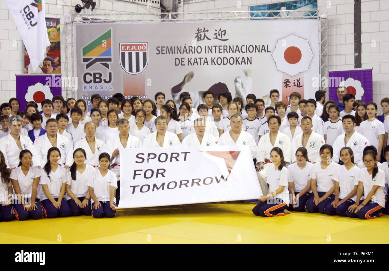 Elementary and junior high school students participating in a judo ...