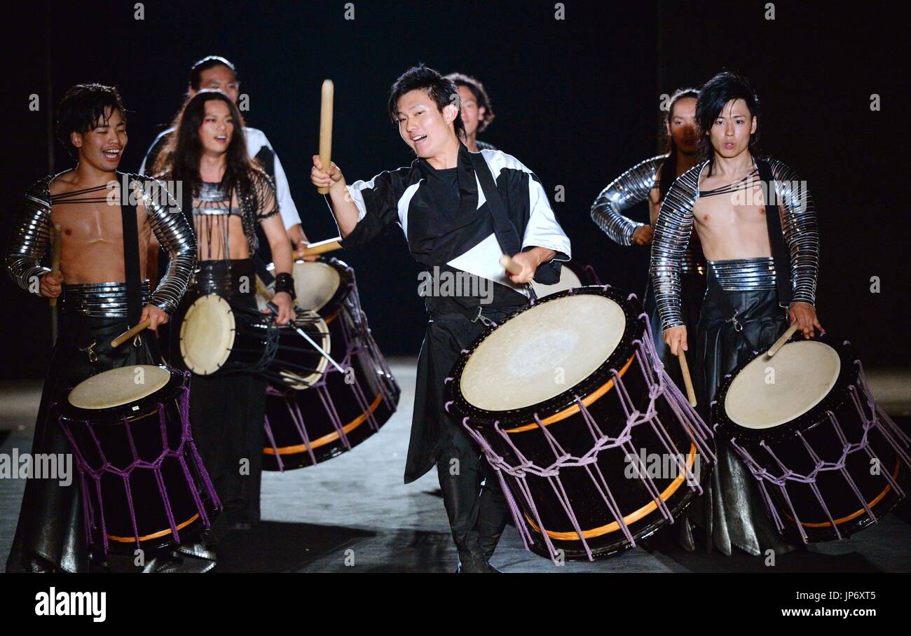 Japanese "taiko" drummers wearing costumes designed by Junko Koshino ...