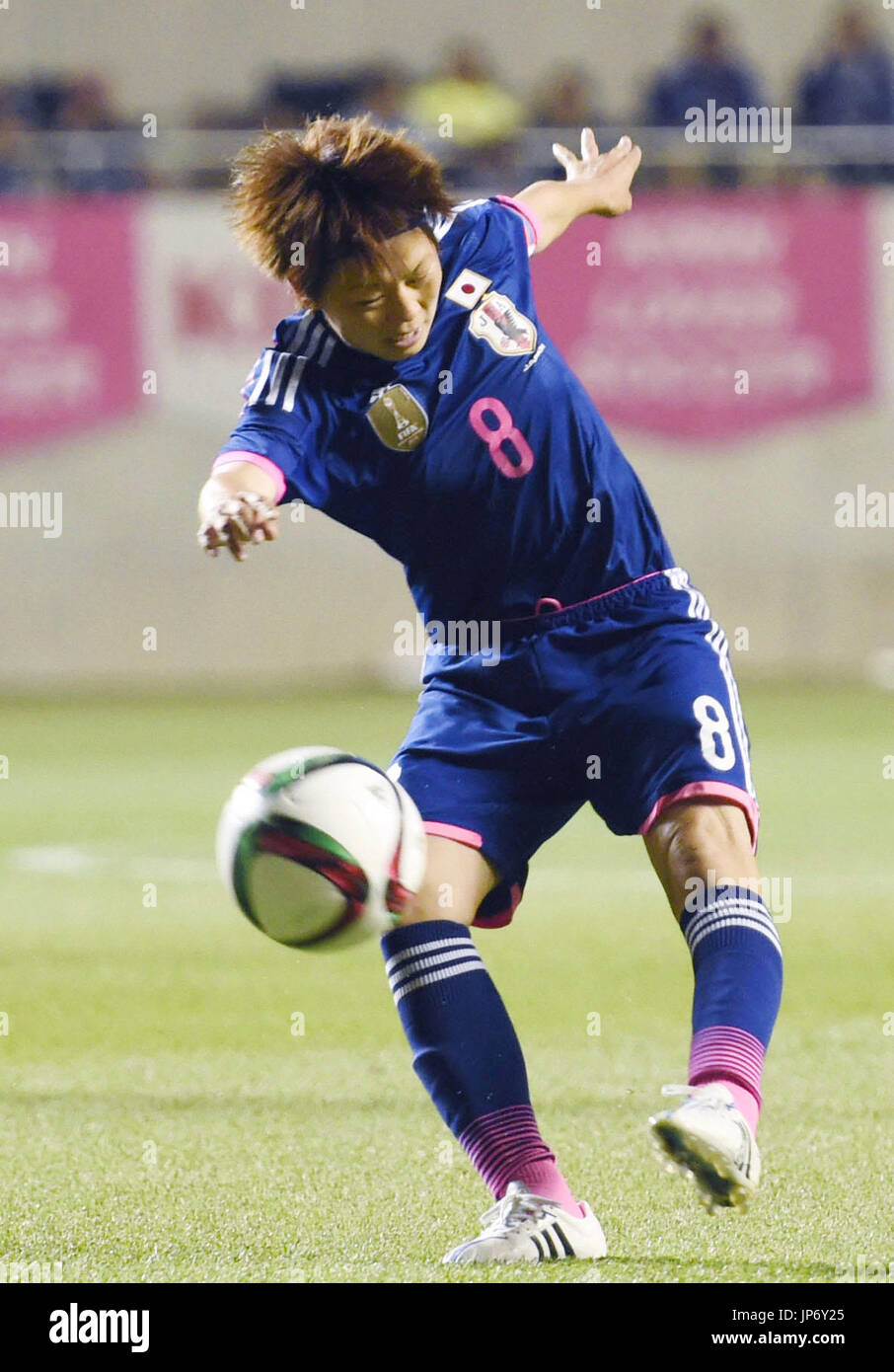 Japan's Aya Miyama shoots during the first half of an international ...