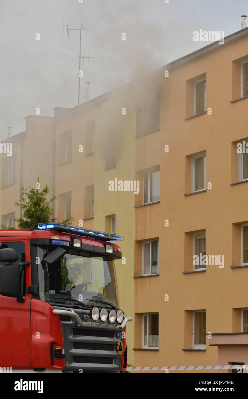 Fire in the apartment block Stock Photo - Alamy