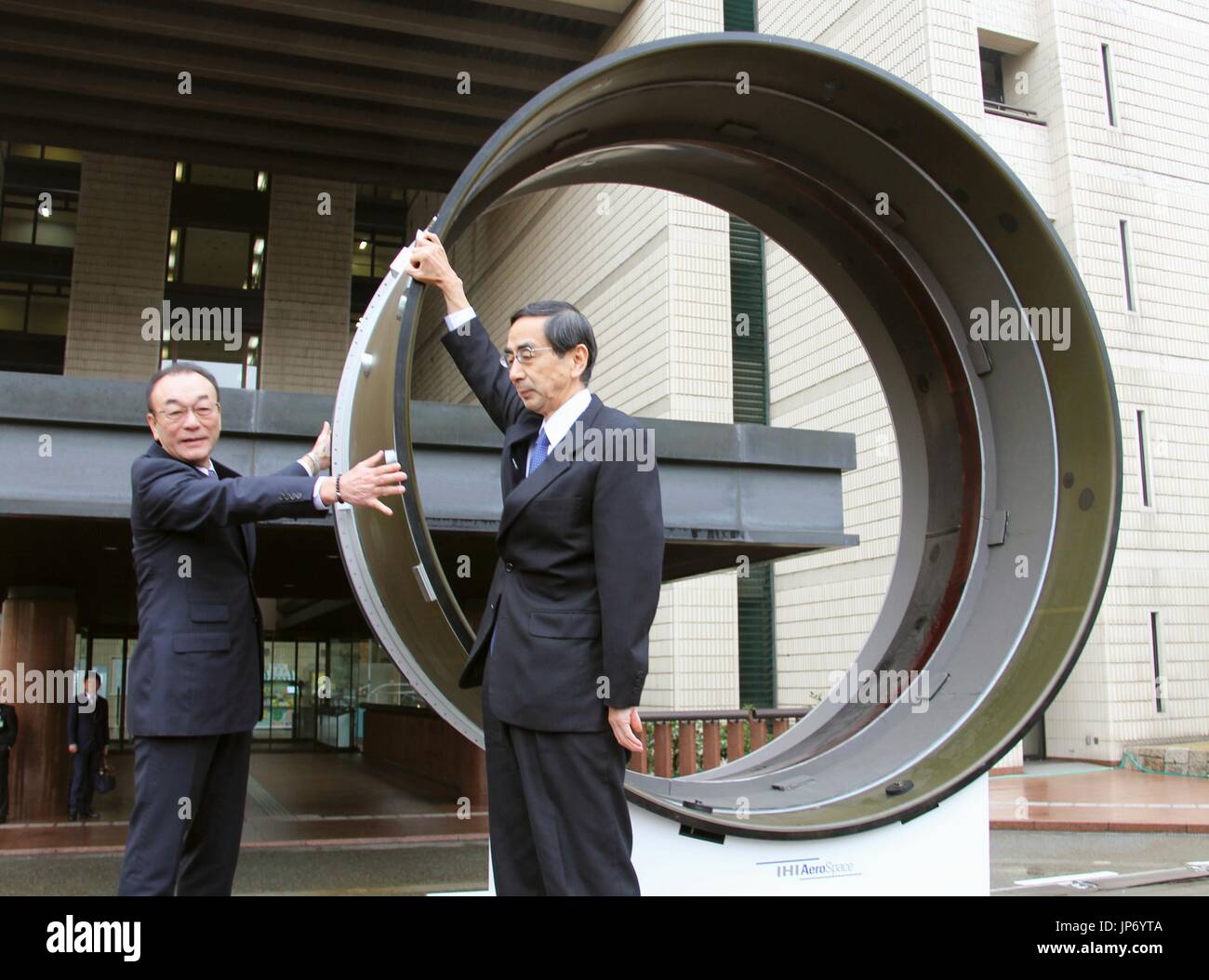 Tadashi Shindo (L), chief executive officer of Shindo Co., and Fukui ...