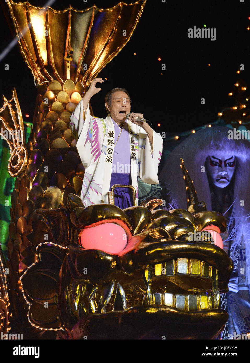 Veteran Japanese "enka" ballad singer Saburo Kitajima sings on a float ...