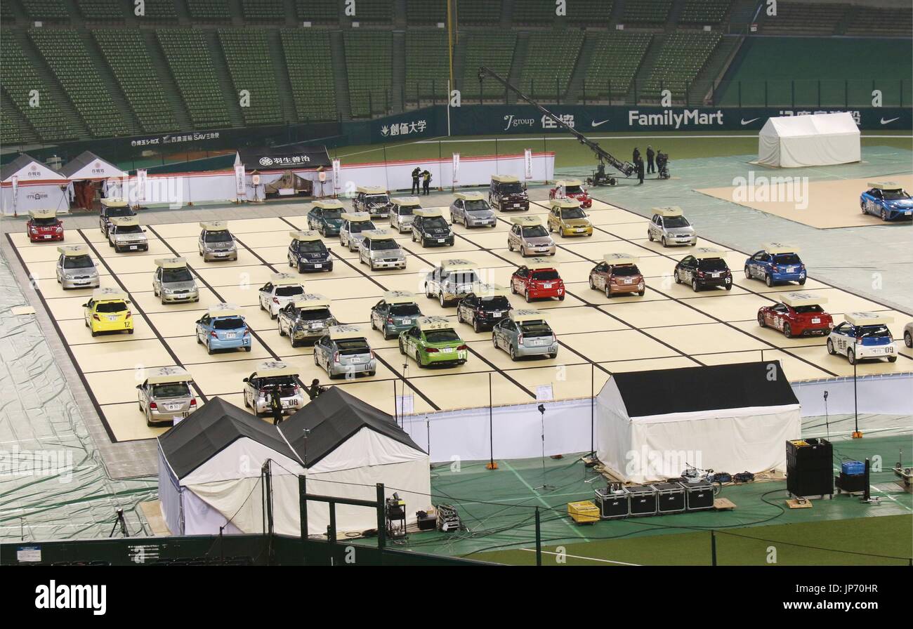 A game of shogi Japanese chess is played using cars at Seibu Dome in ...