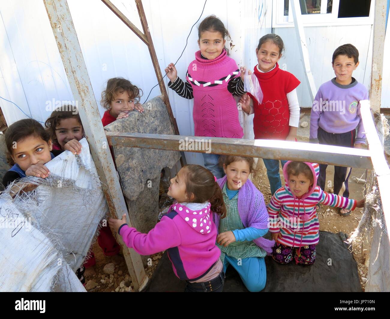 Syrian refugee children play at the Zaatari refugee camp in northern ...