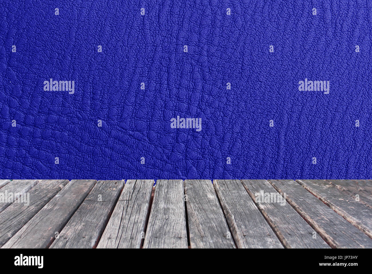 wood table on blue leather texture Stock Photo - Alamy