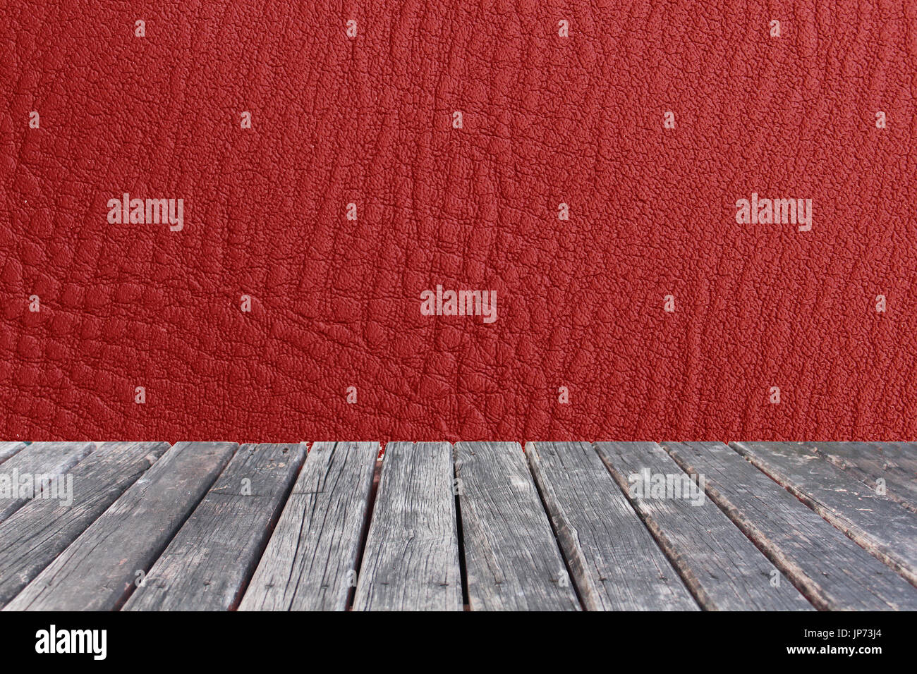 wood table on red leather texture Stock Photo - Alamy