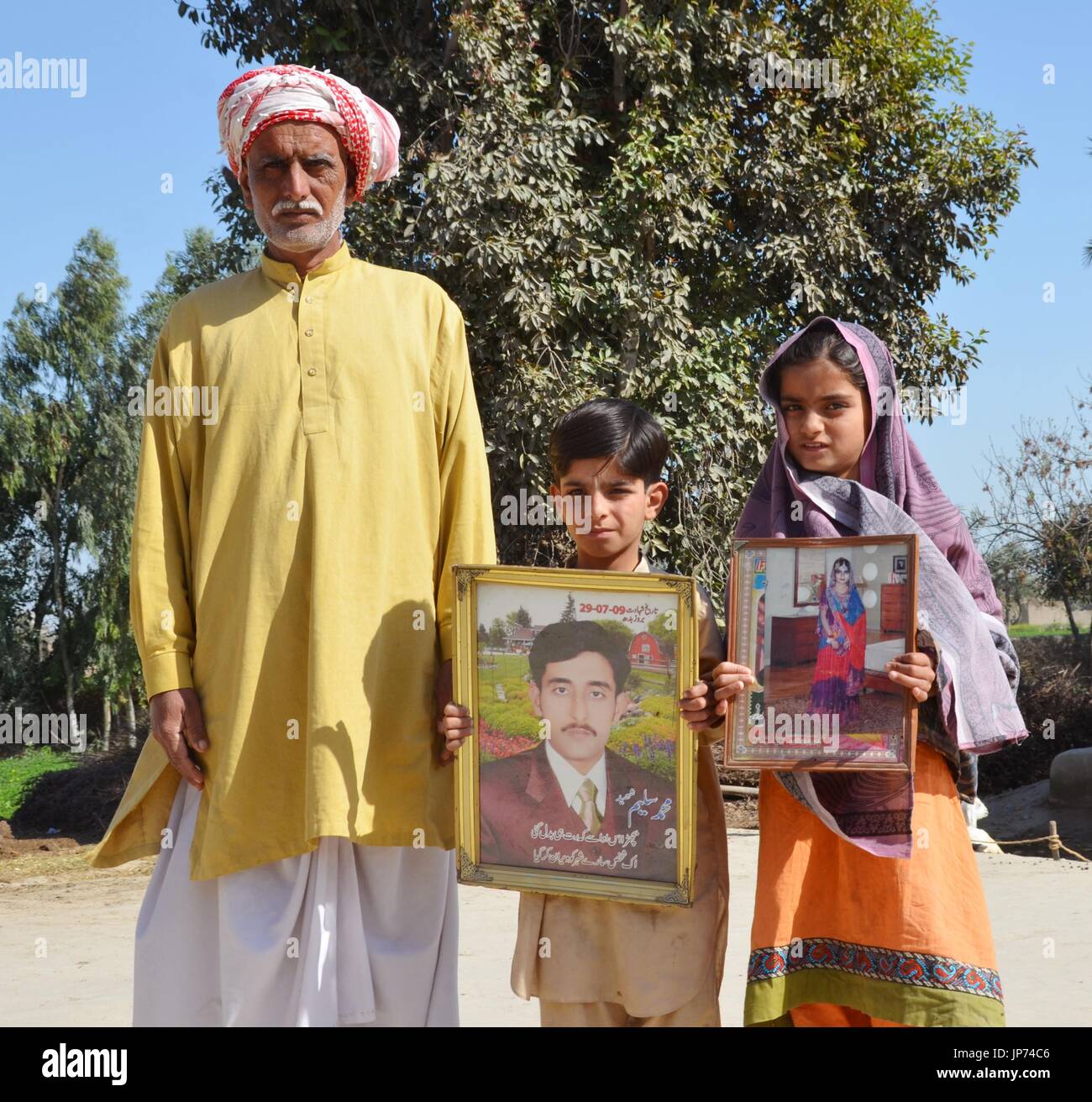 Two Pakistani children orphaned by the "honor killing" of their parents ...