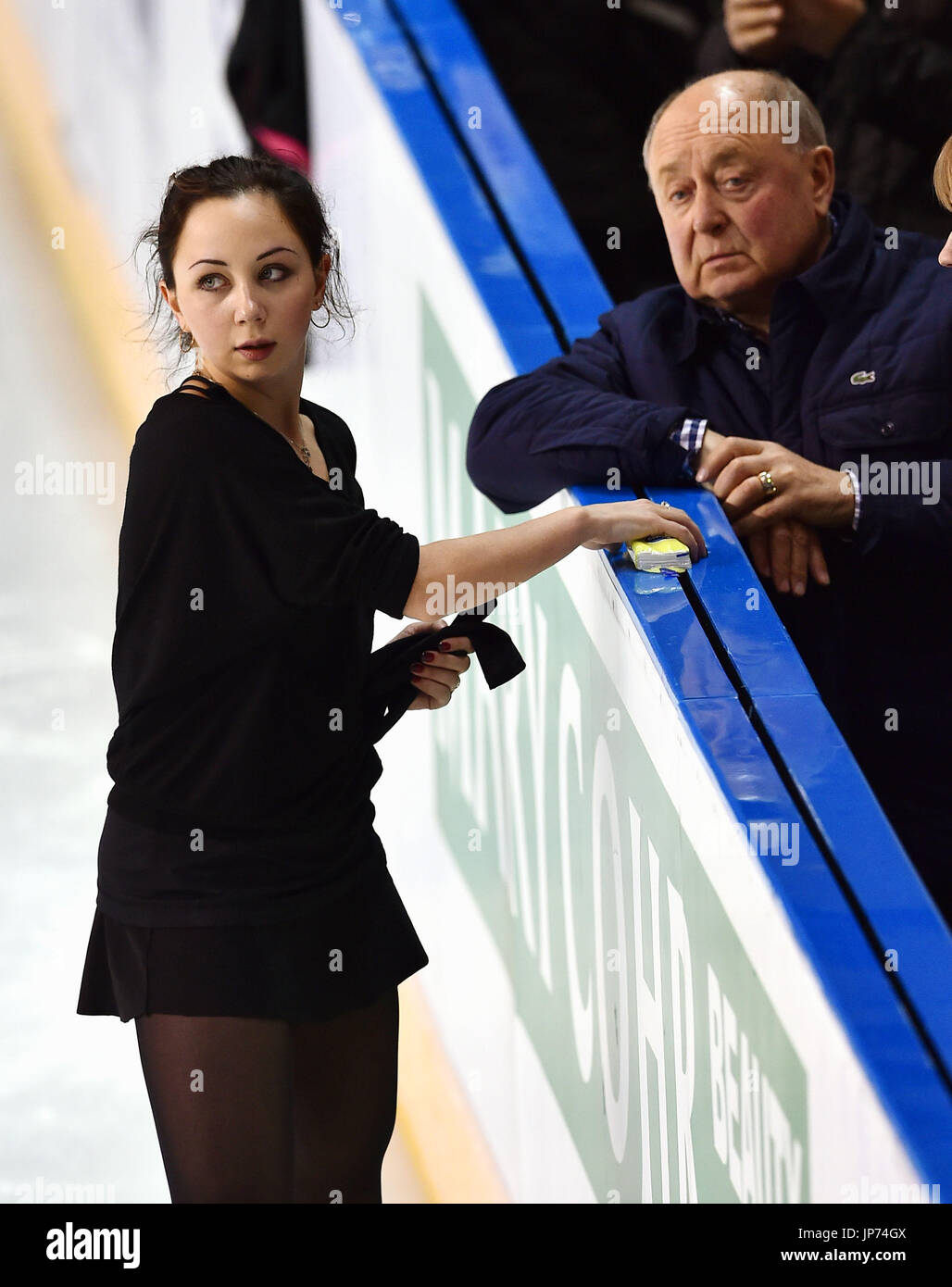 Elizaveta Tuktamysheva of Russia speaks with coach Alexei Mishin during ...