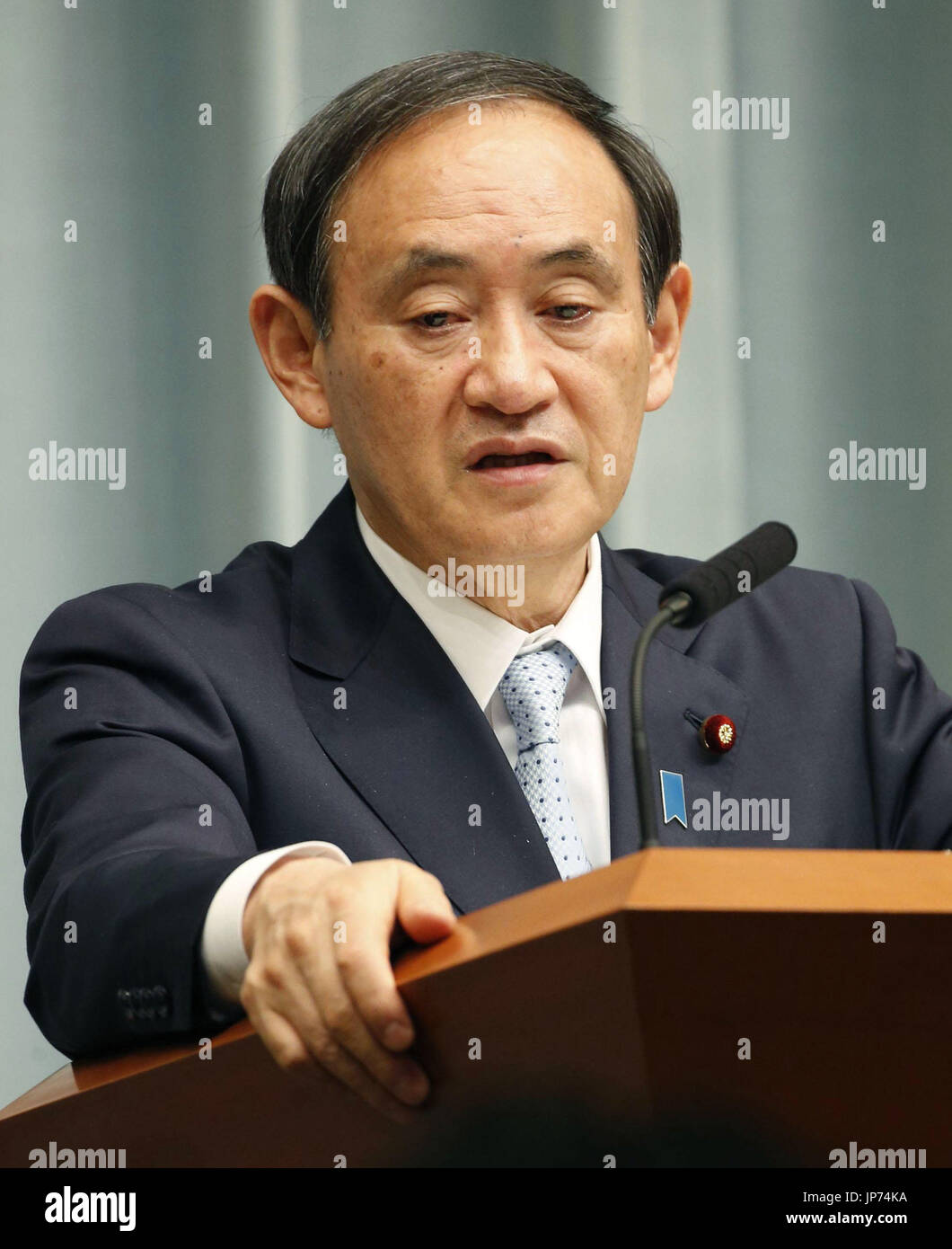 Chief Cabinet Secretary Yoshihide Suga speaks at a press conference at ...
