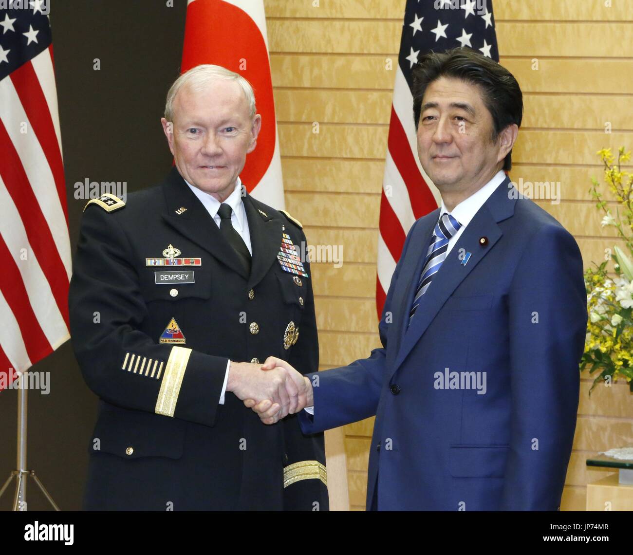 Japanese Prime Minister Shinzo Abe (R) meets with Gen. Martin Dempsey ...