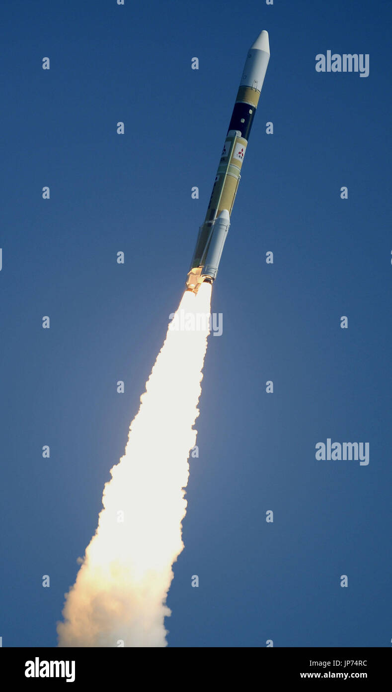 An H-2A rocket ascends in the sky after being launched from the ...