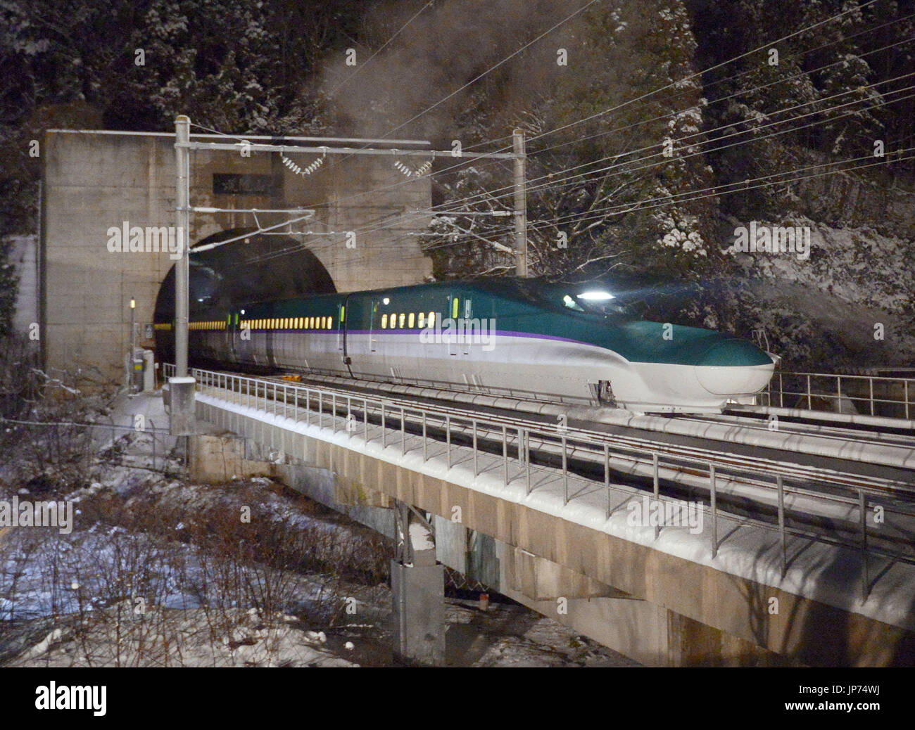 An H5 series bullet train for the Hokkaido Shinkansen Line exits the ...