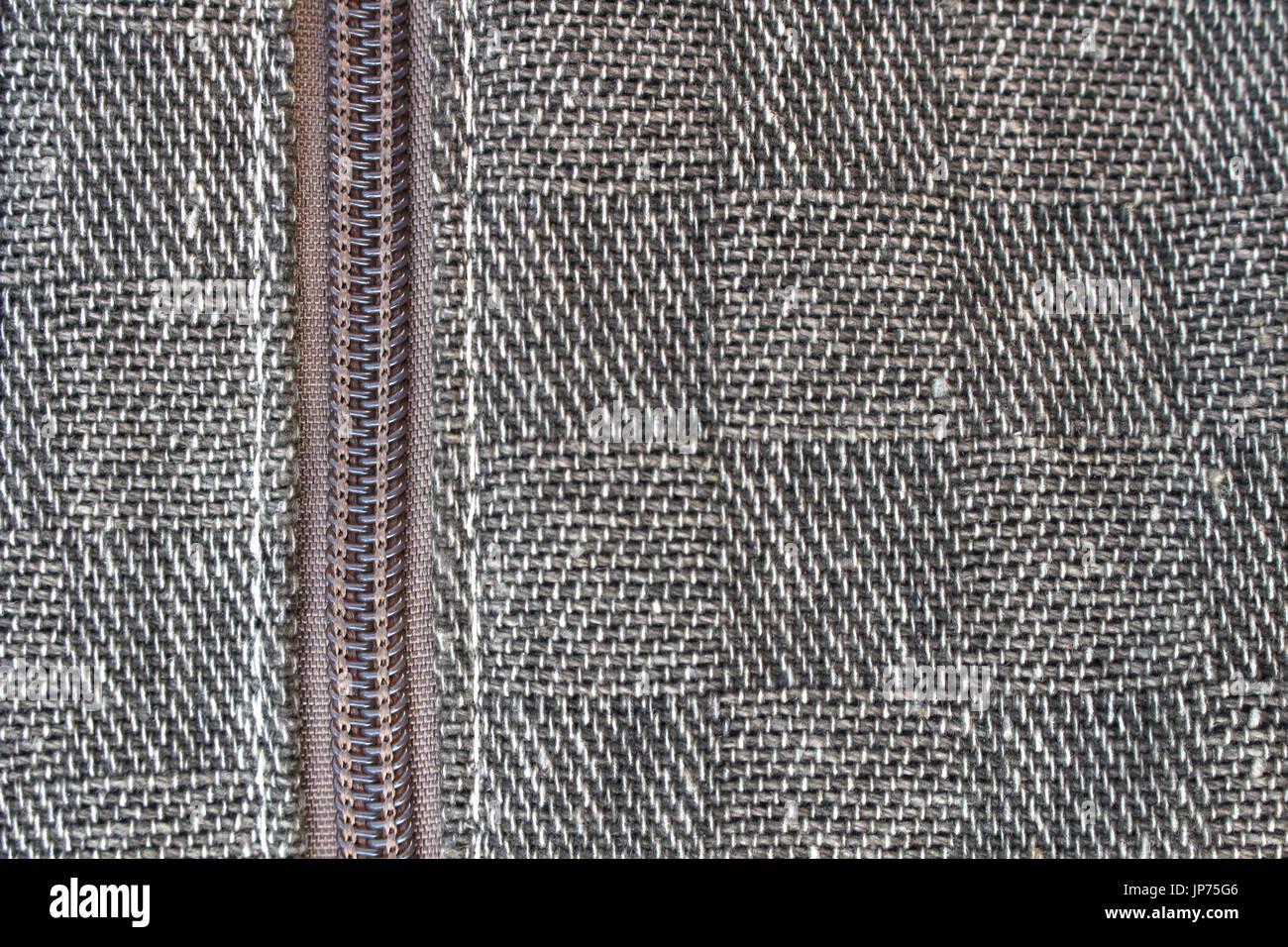 Zip of cloth background Stock Photo - Alamy