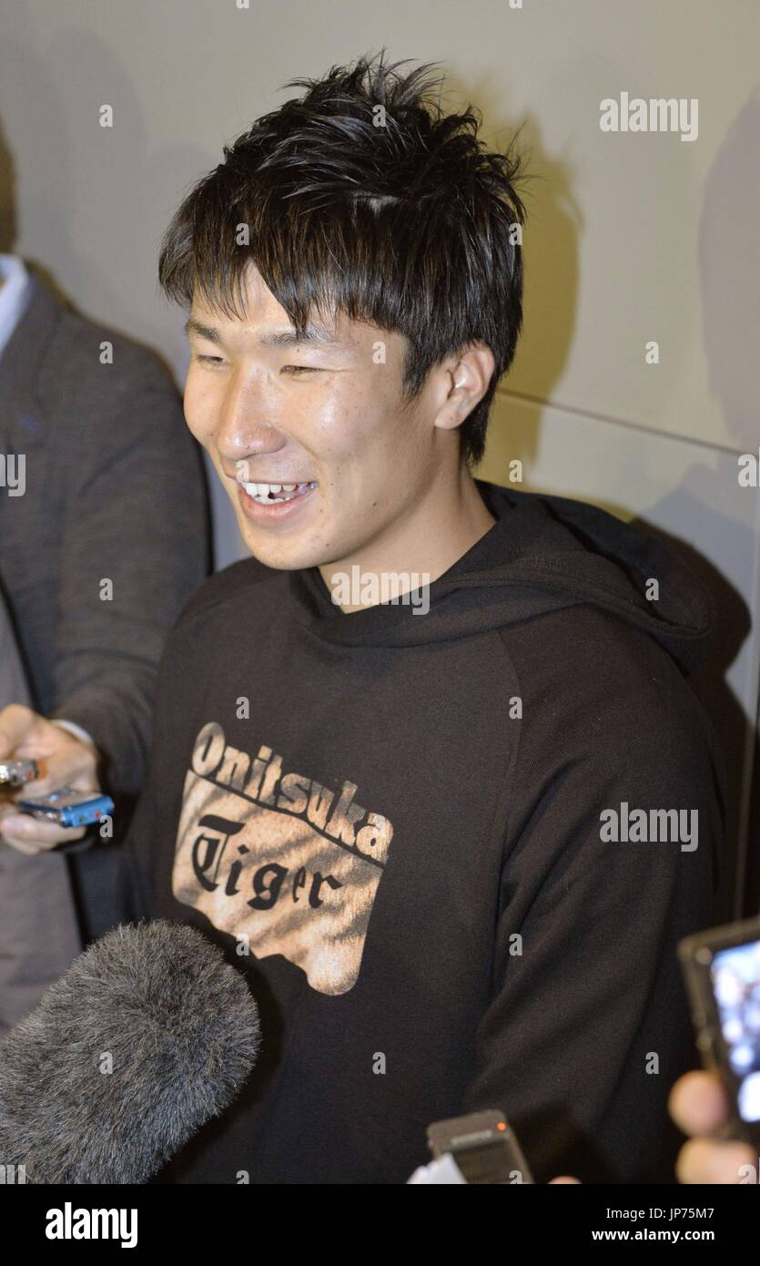 Japanese sprinter Yoshihide Kiryu meets the press after his arrival at ...