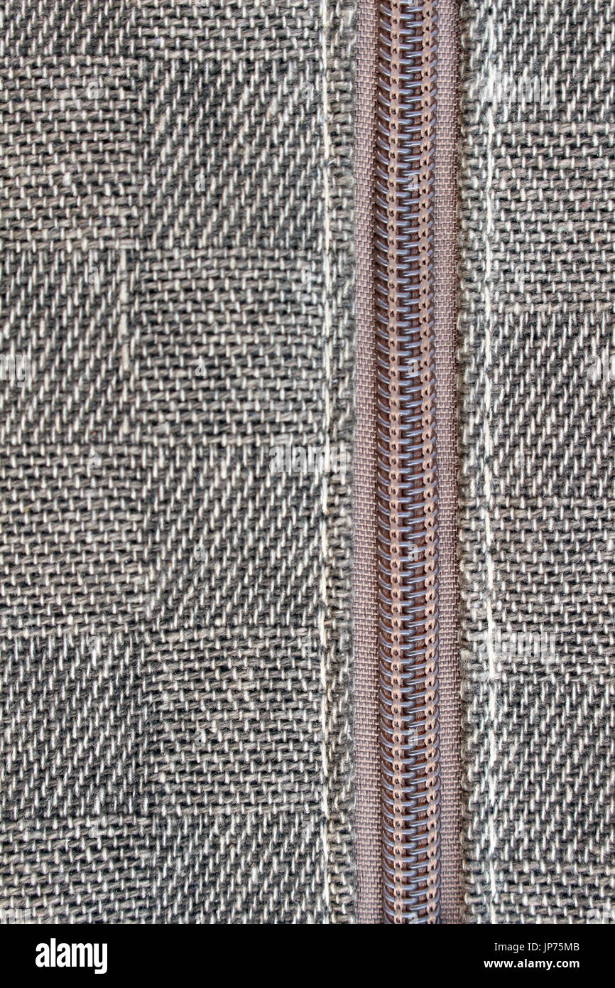 Zip of cloth background Stock Photo - Alamy