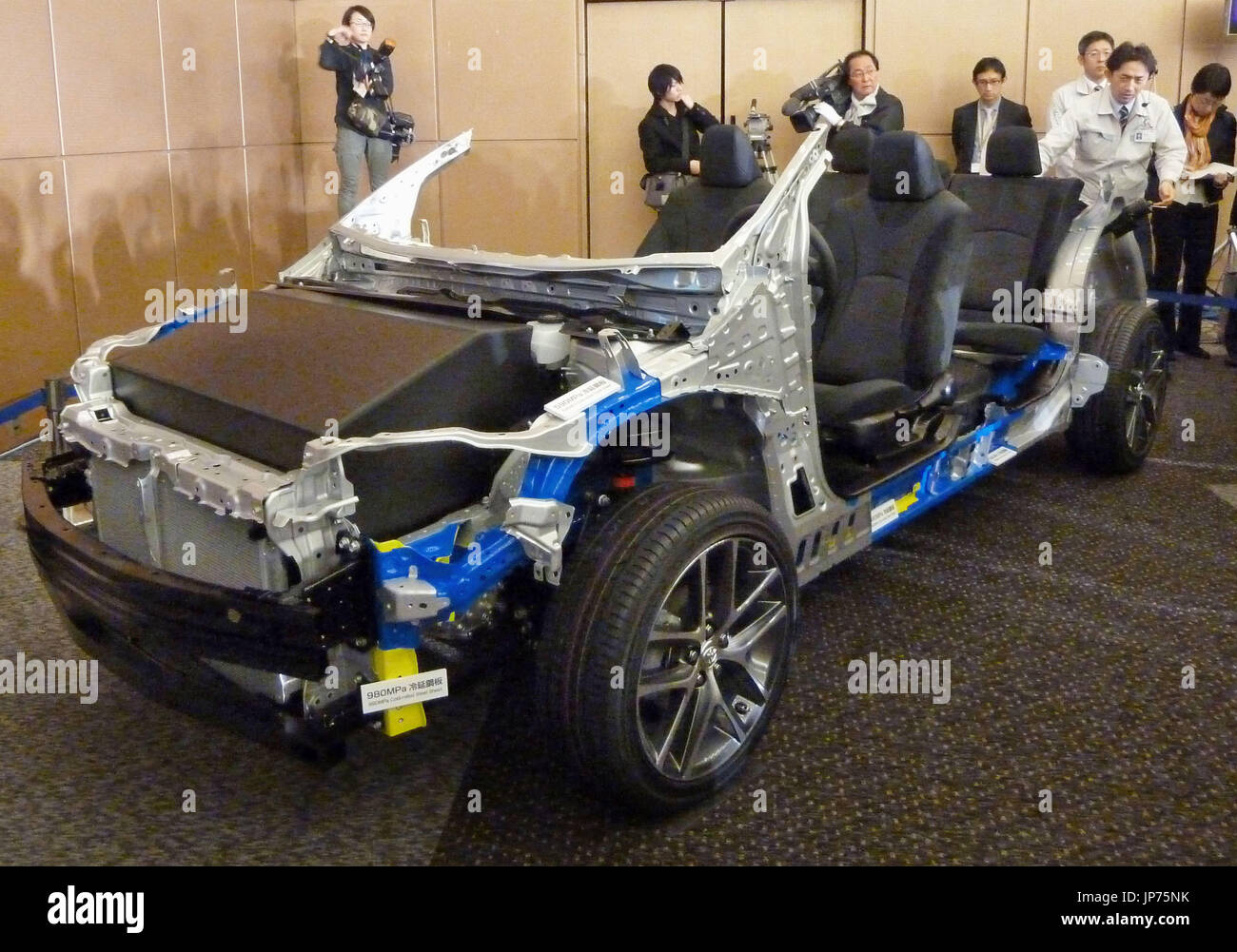Toyota Motor Corp. shows the press a vehicle framework to explain its ...