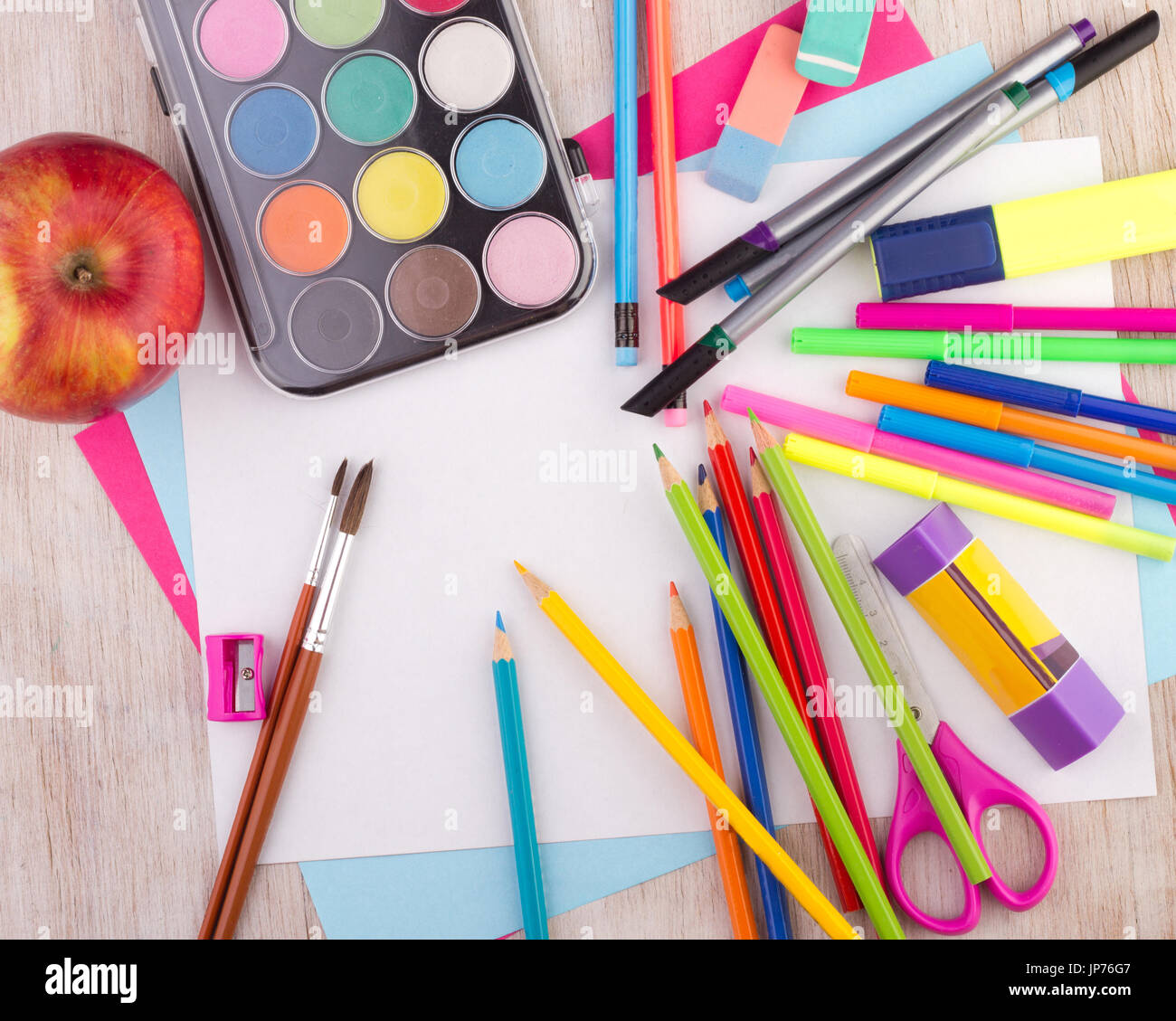 Top view of school supplies on collage papers on wooden desk Stock ...