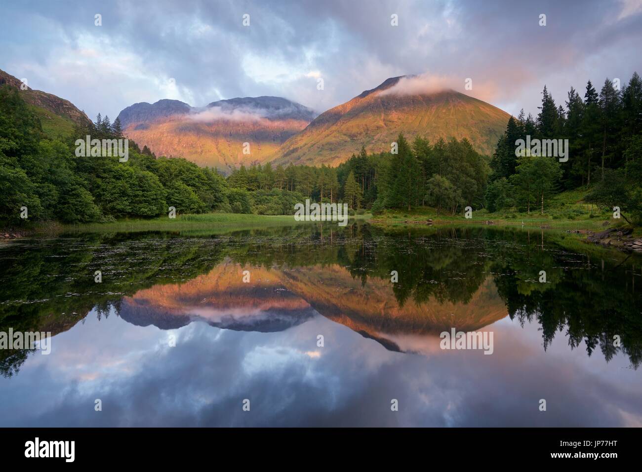 A colourful image of the sunset in Glencoe taken from the Torren Lochan ...