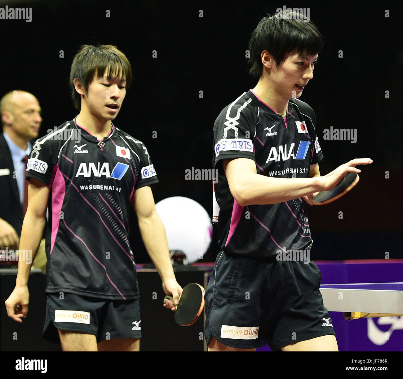 Japan's Kenta Matsudaira (R) and Koki Niwa are subdued after losing to ...