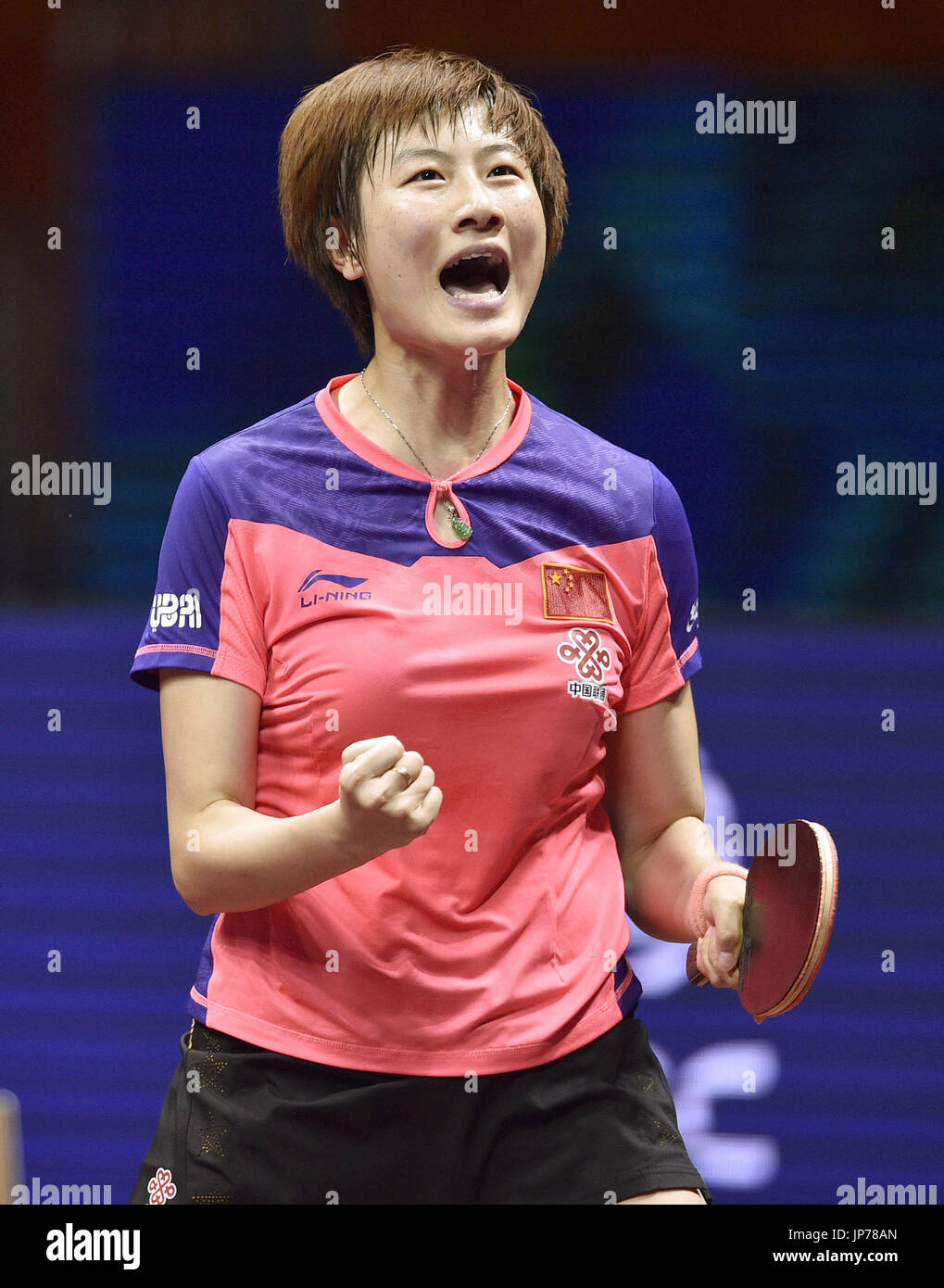 China's Ding Ning celebrates after beating compatriot Liu Shiwen in the ...