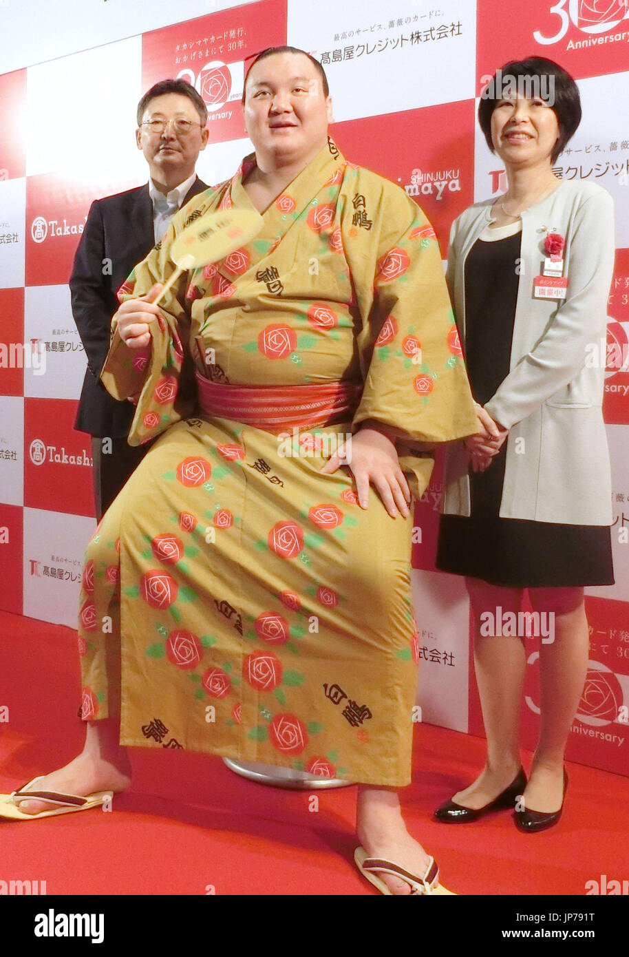 Mongolian grand champion Hakuho attends a promotional event at a ...