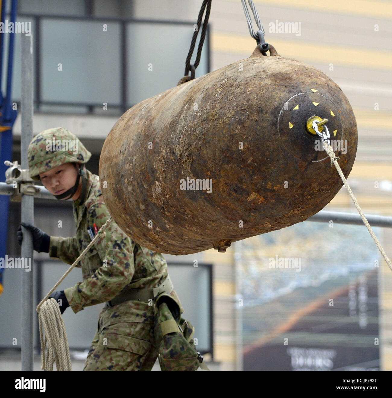 After defusing it, Ground Self-Defense Force personnel on May 9, 2015 ...