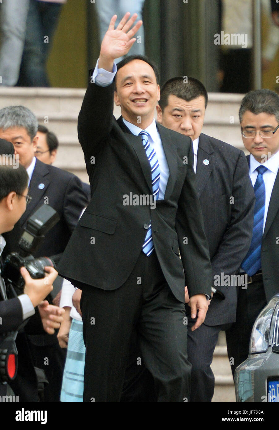 Eric Chu, chairman of Taiwan's ruling Kuomintang (KMT) party, waves to ...