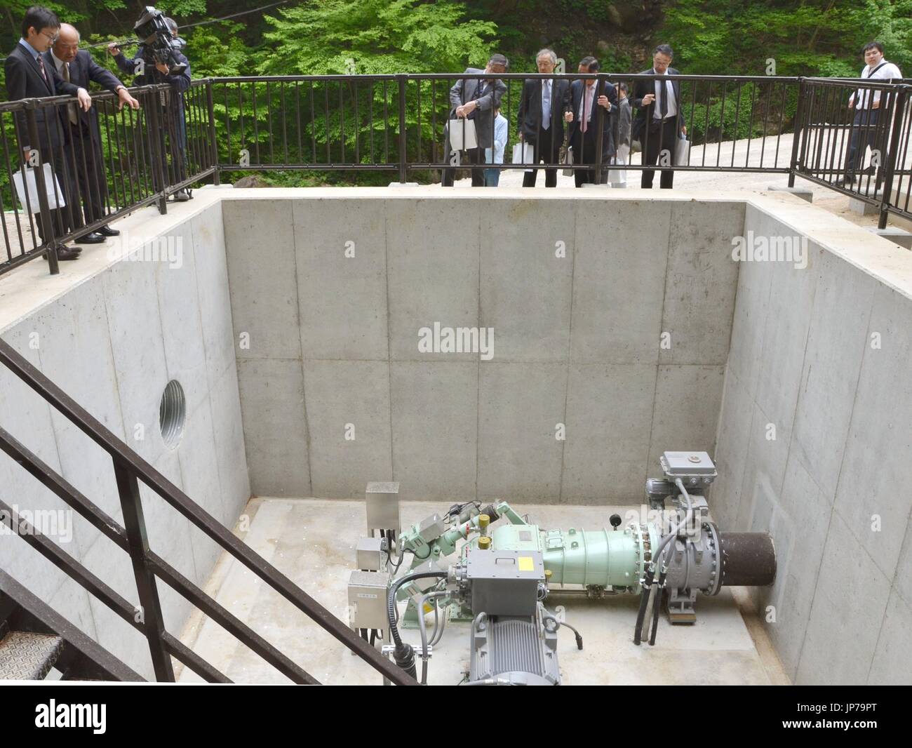 A generator at a small hydropower plant in Fukshima's Tsuchiyu-onsen ...