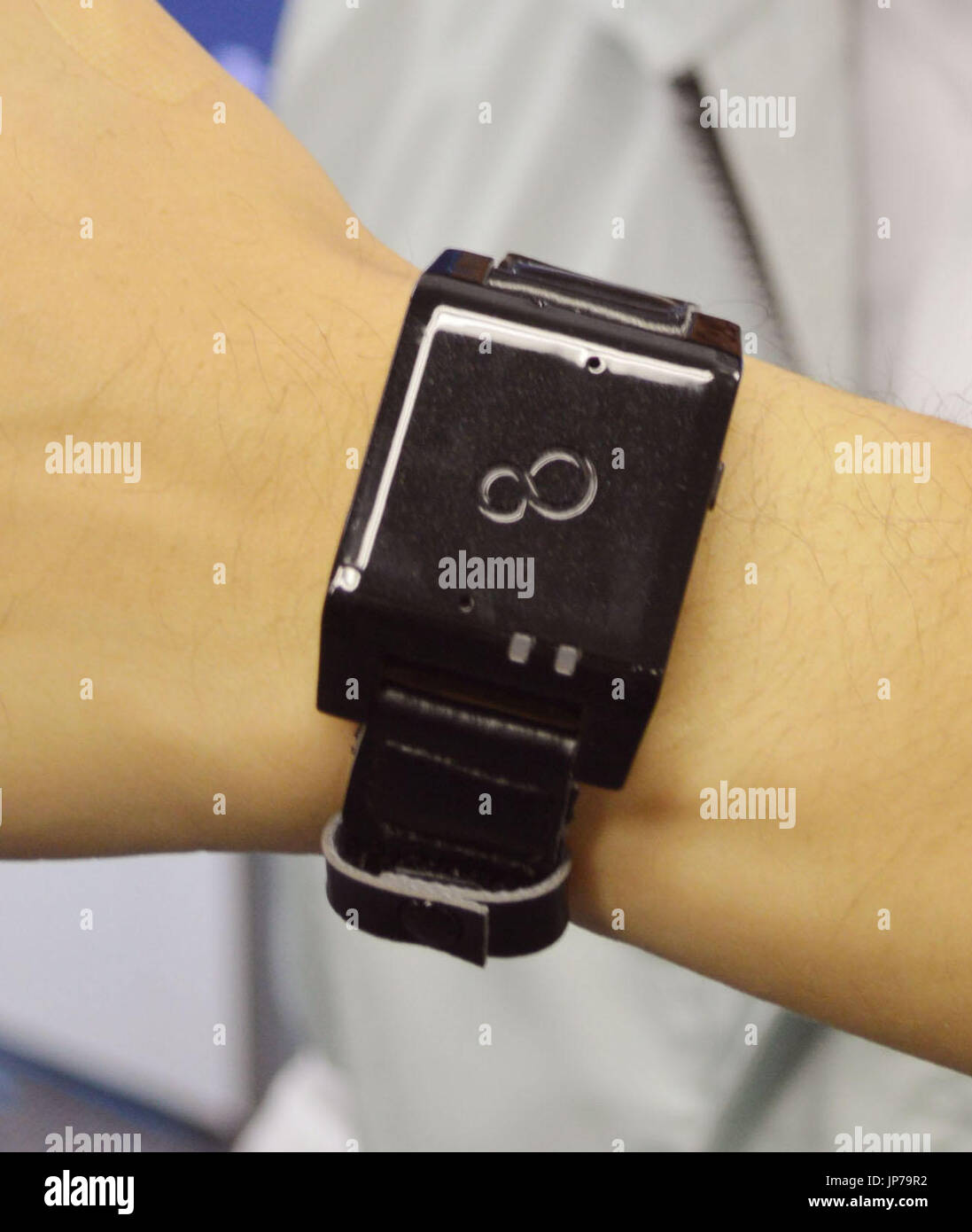 A prototype of Fujitsu Ltd.'s vital-sign sensing band is shown in Tokyo ...