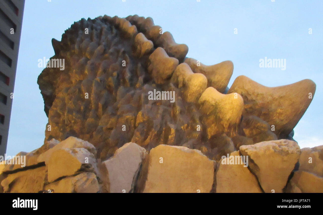 The back of a replica of Godzilla's head on the eighth-floor terrace of ...