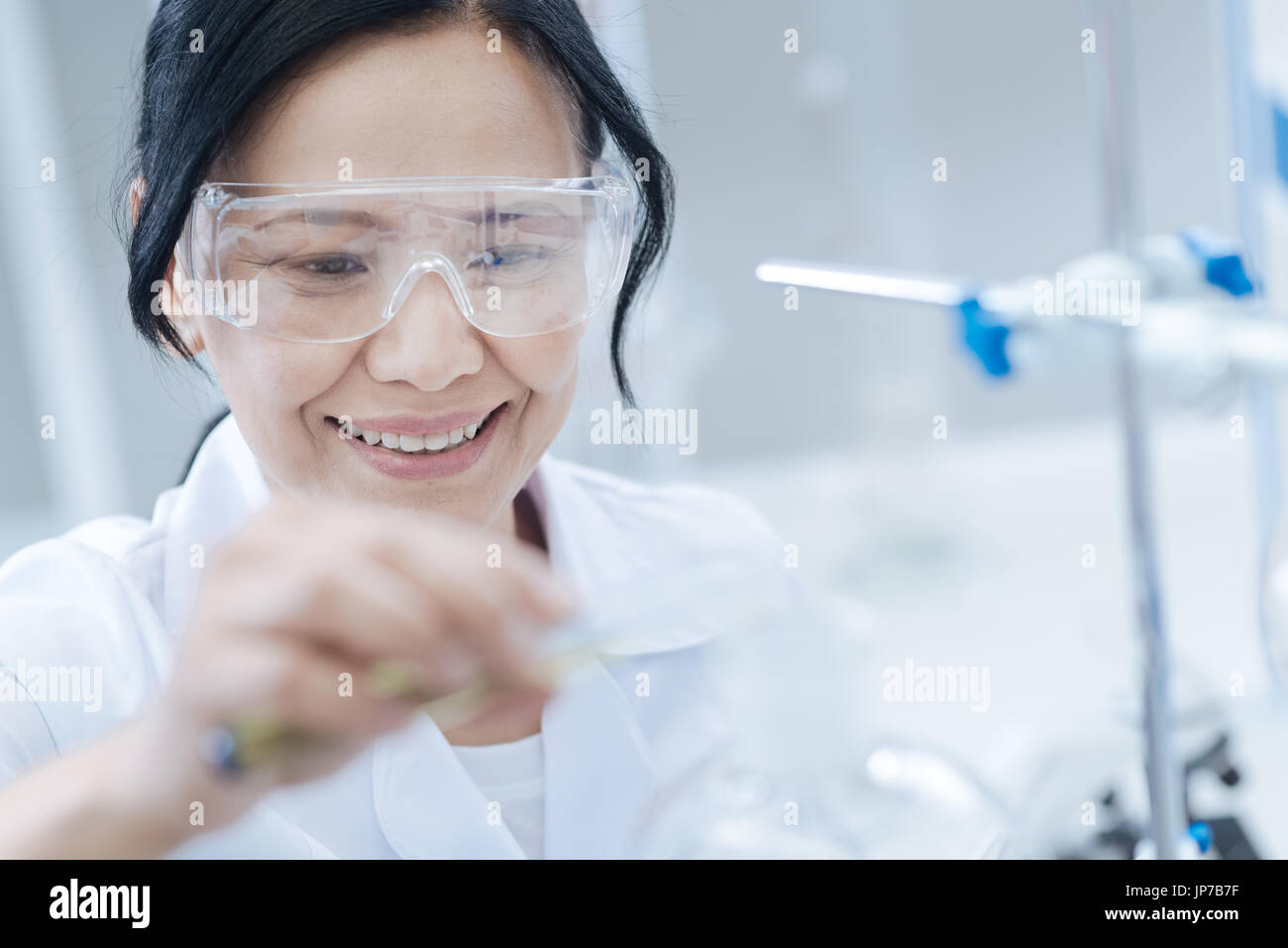 Happy cheerful scientist smiling Stock Photo - Alamy