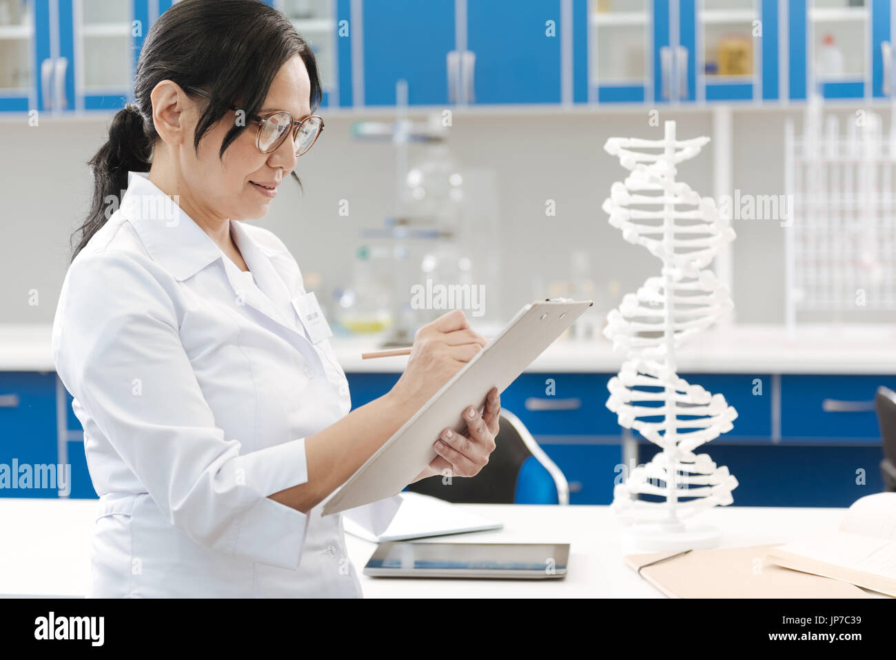 Scientific observation noting hi-res stock photography and images - Alamy