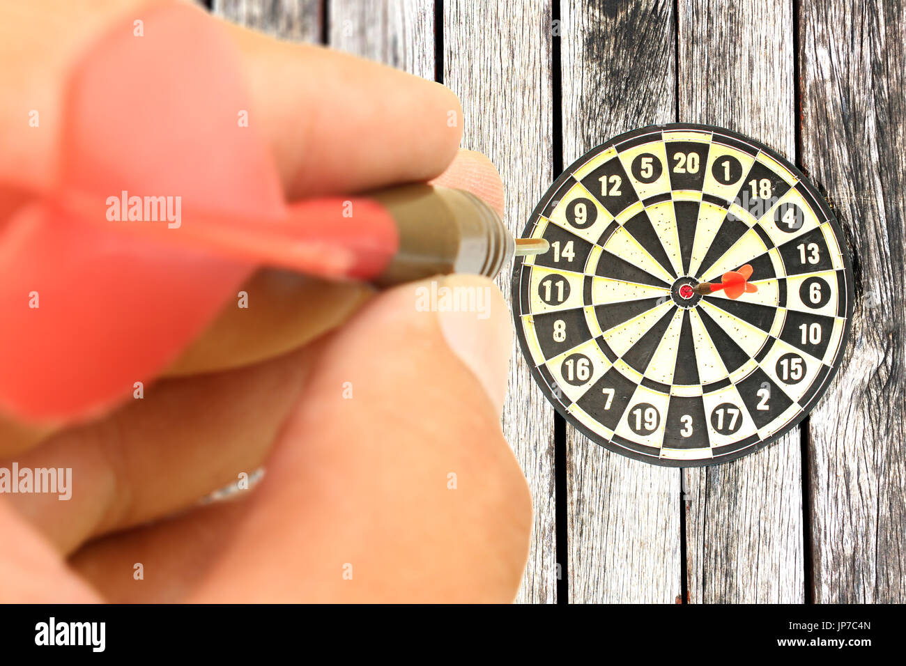 target on Wood background Stock Photo - Alamy
