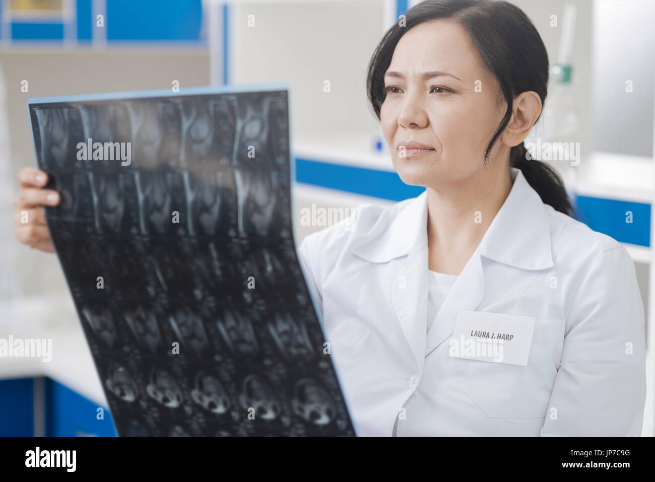 Serious professional doctor putting a diagnosis Stock Photo - Alamy