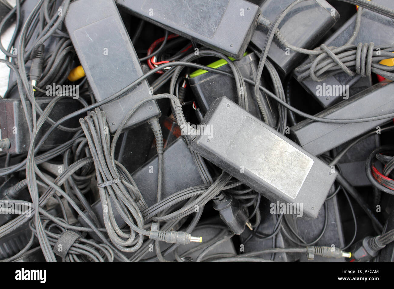 old adapter and charger background Stock Photo - Alamy