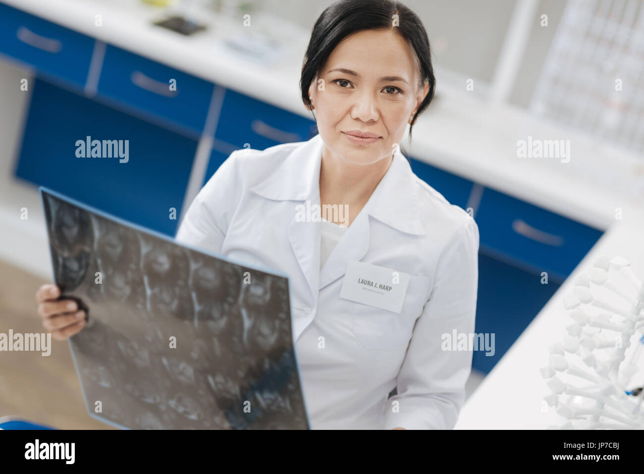 Intelligent smart woman looking at you Stock Photo - Alamy