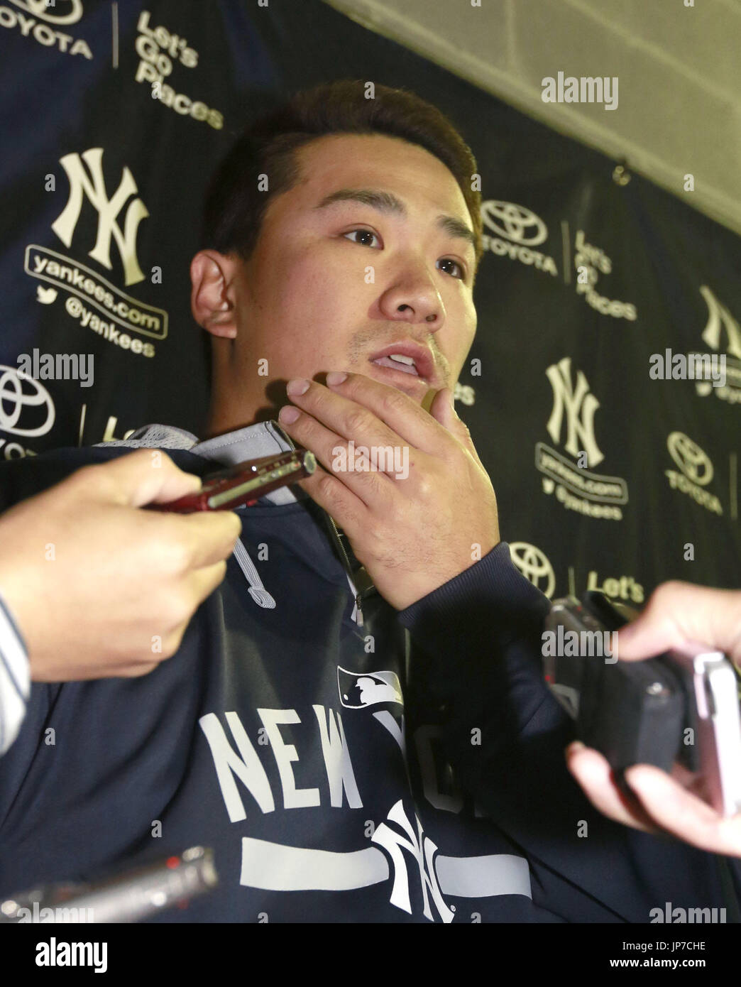 New York Yankees right-hander Masahiro Tanaka speaks with reporters in ...